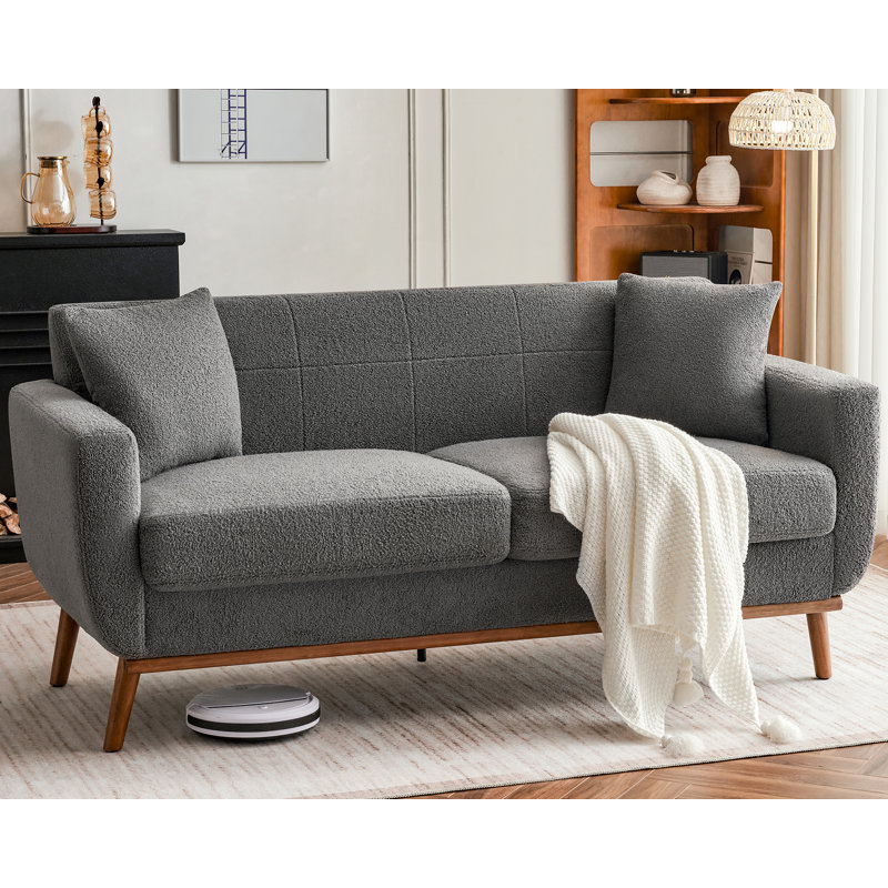 Grey couch with wooden legs store